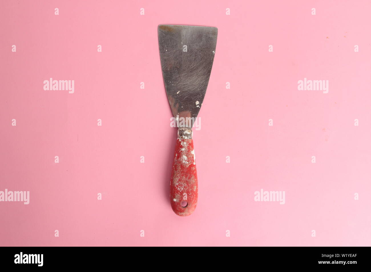 spatula of work used in colorful background Stock Photo - Alamy
