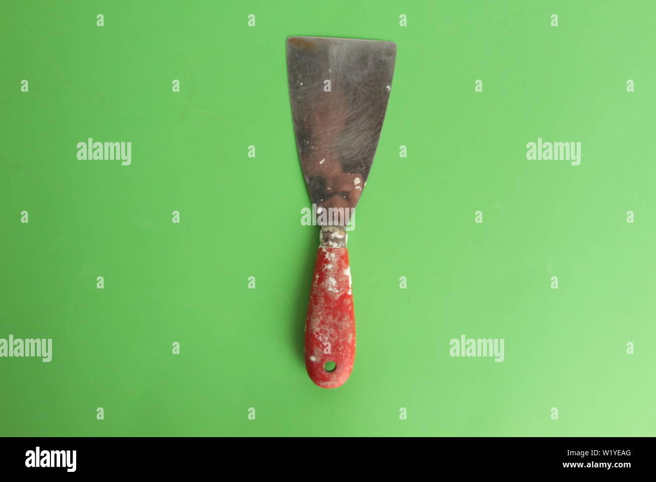spatula of work used in colorful background Stock Photo - Alamy