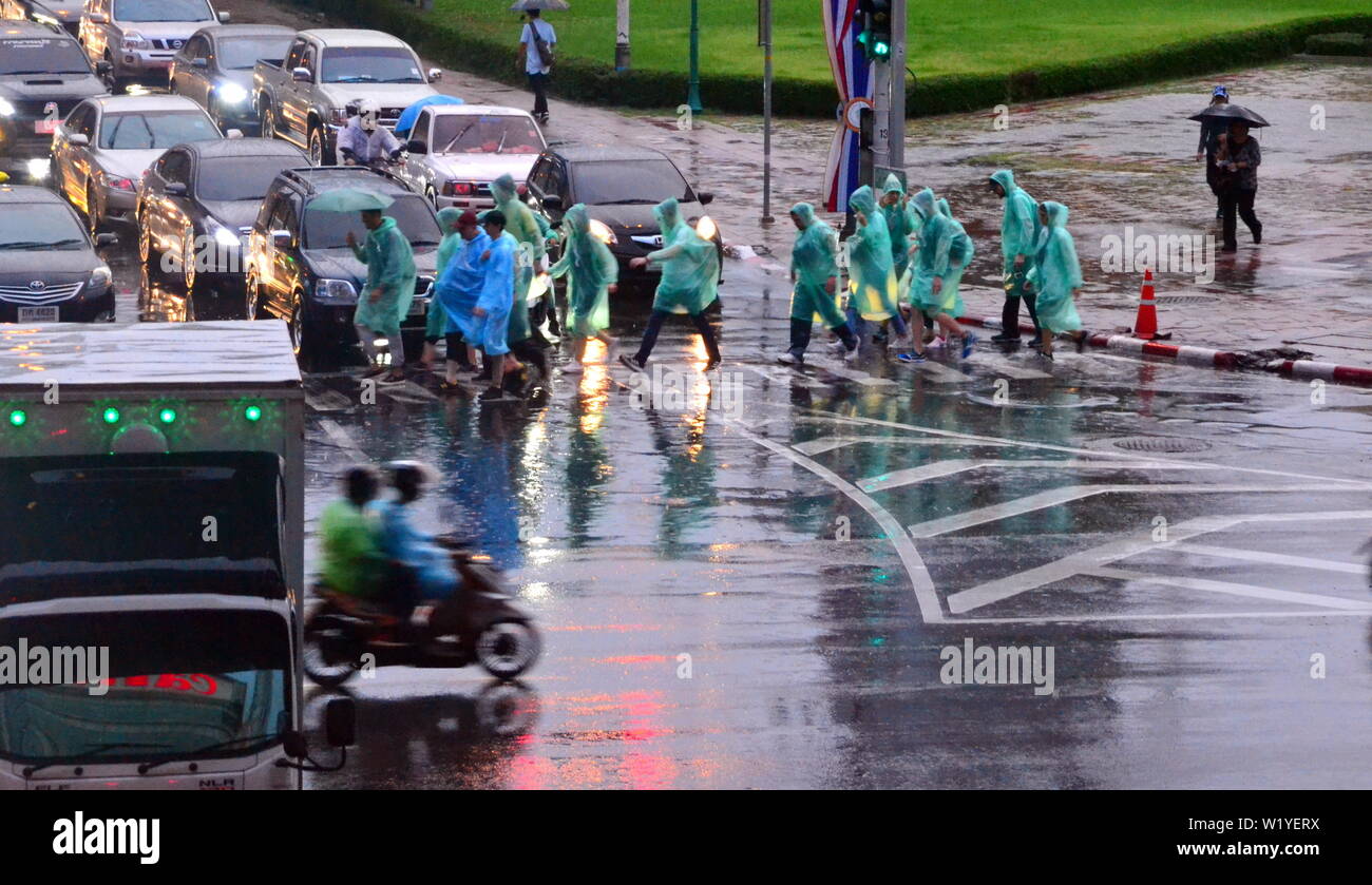 Rainy season at evening rush hour in Bangkok, Thailand. A line of ...