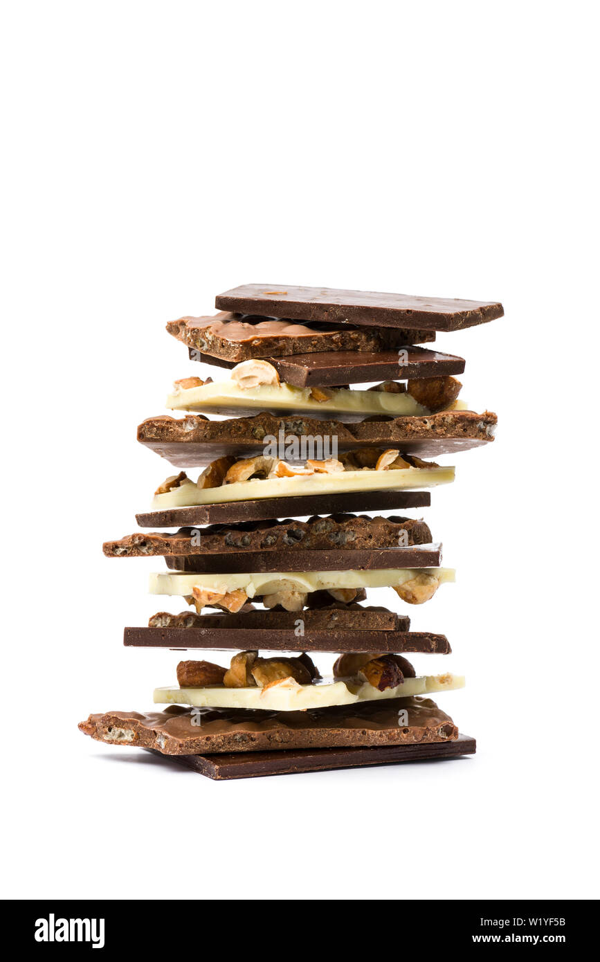 pile of mixed chocolate pieces, on white background Stock Photo - Alamy