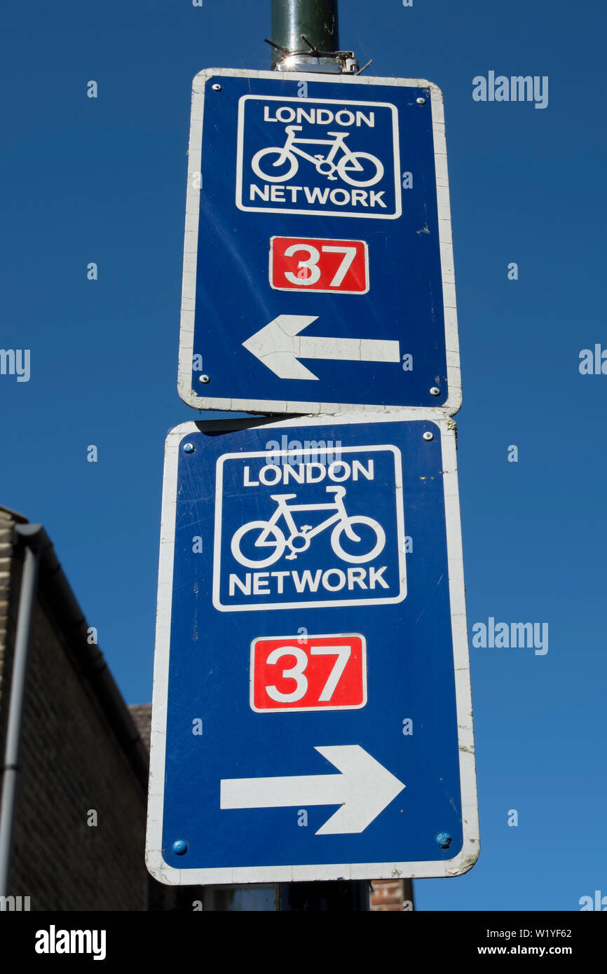 london cycle network route 37 signs pointing in opposite directions, in ...