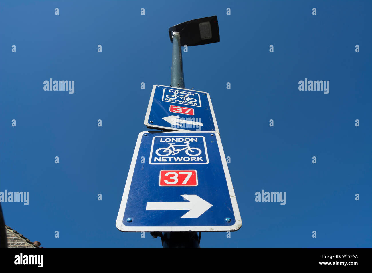 london cycle network route 37 signs pointing in opposite directions, in ...