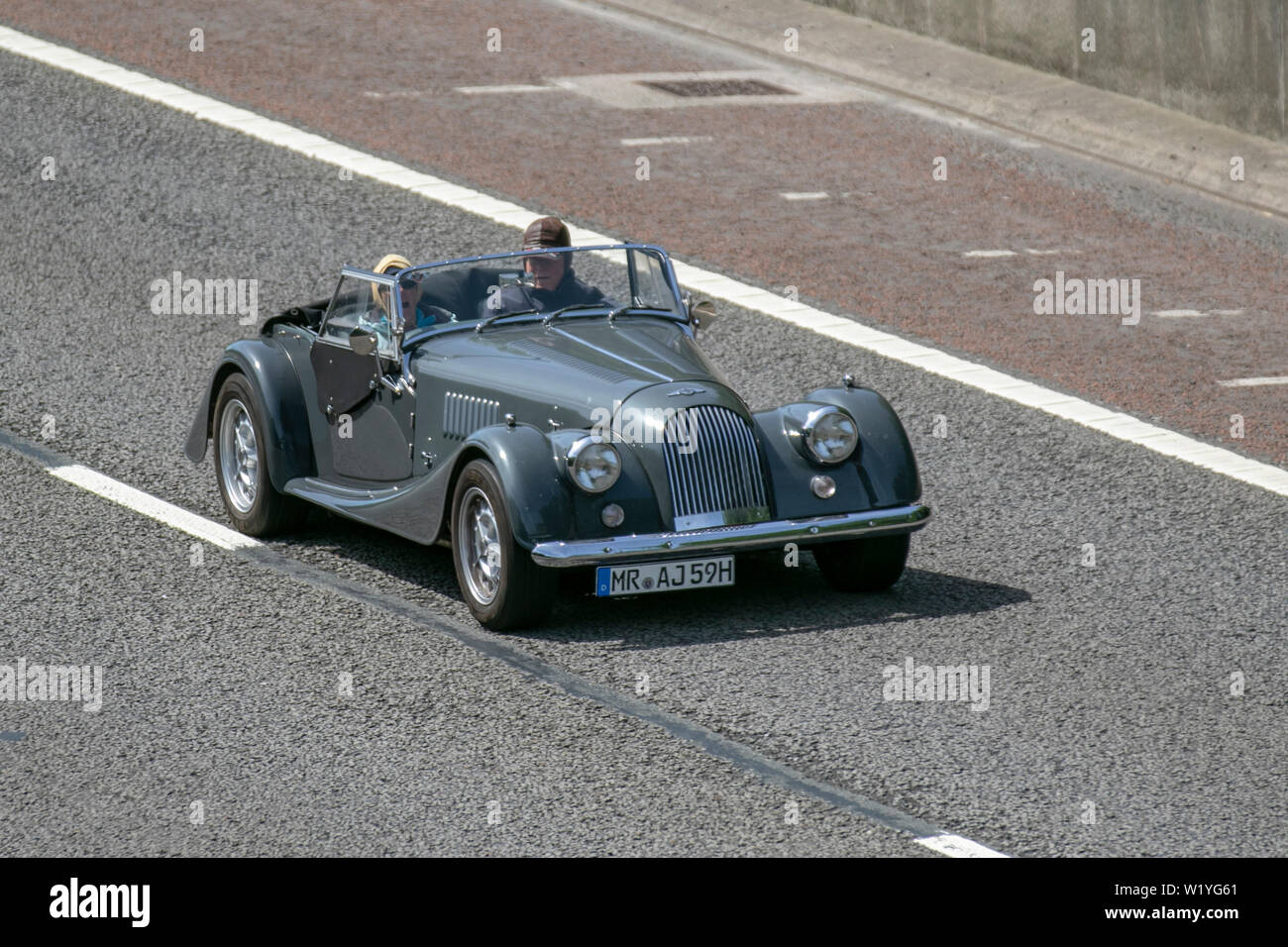 Vintage grey green Morgan Plus-4 classic two-seater sports car; UK ...