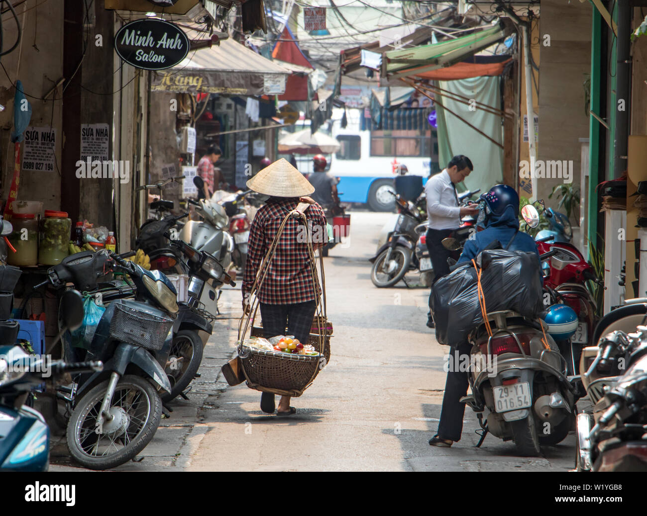 HANOI, VIETNAM, APR 21 2019, A street life in the center of Hanoi Stock ...