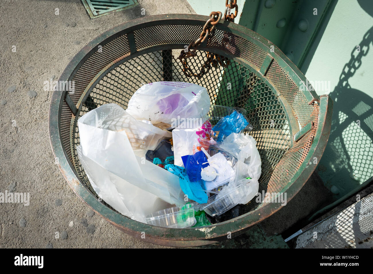 New York City, NY/USA - 3/19/2019: Old metal garbage can on a street in ...