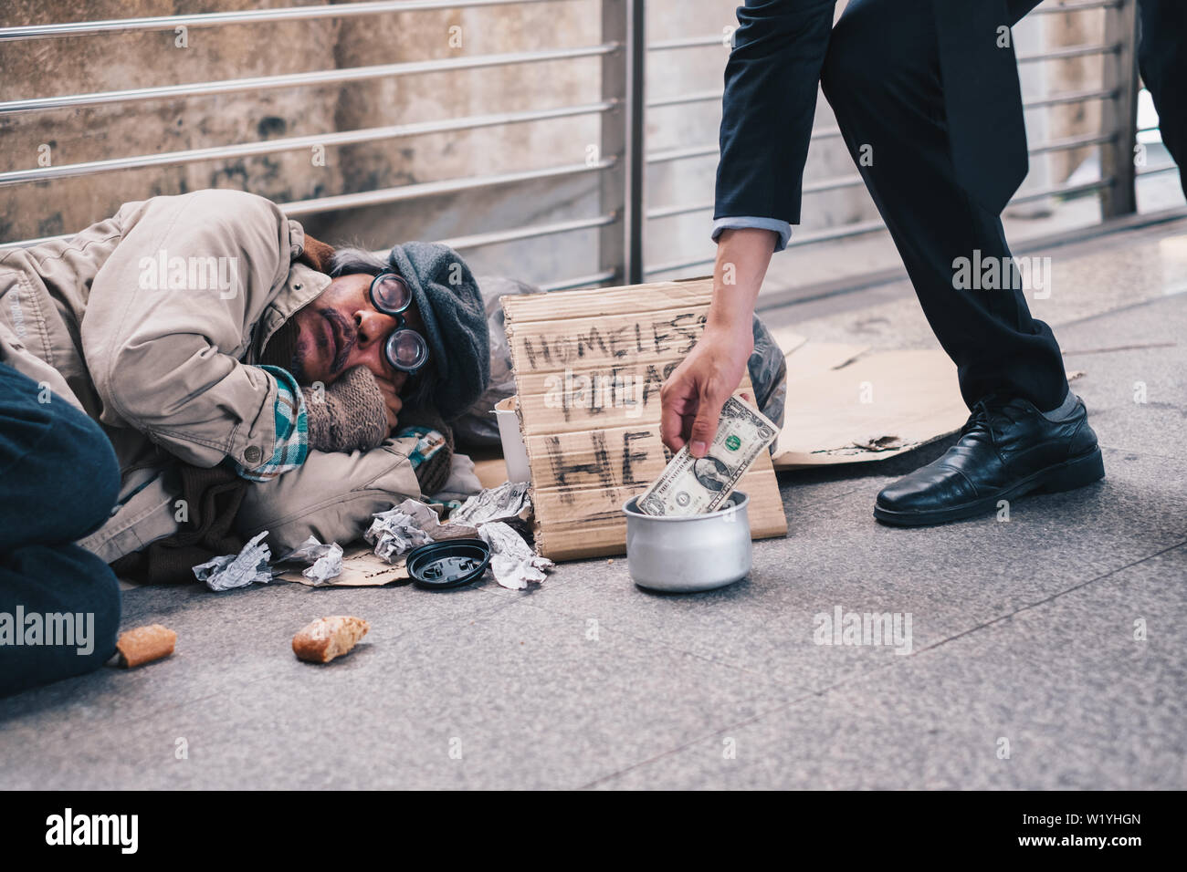 Throwing Money At Homeless People