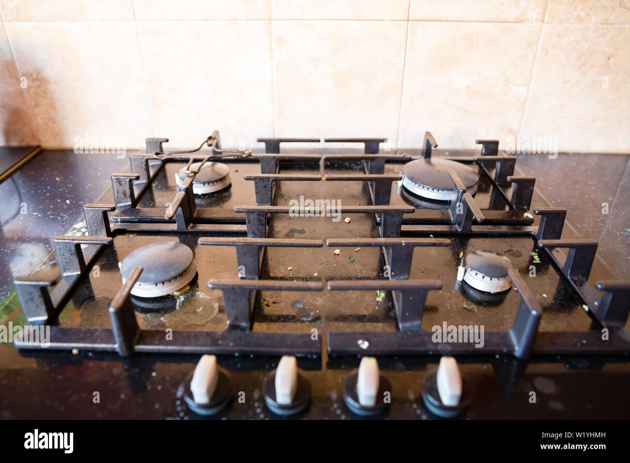 Very dirty gas stove in kitchen Stock Photo - Alamy