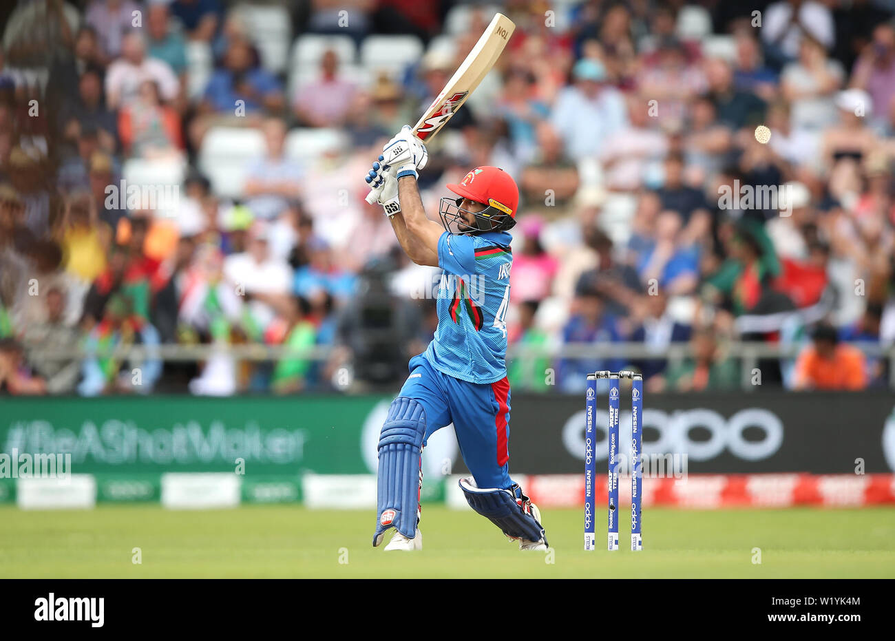 Afghanistan's Ikram Alikhil hits the ball for a boundry during the ICC ...