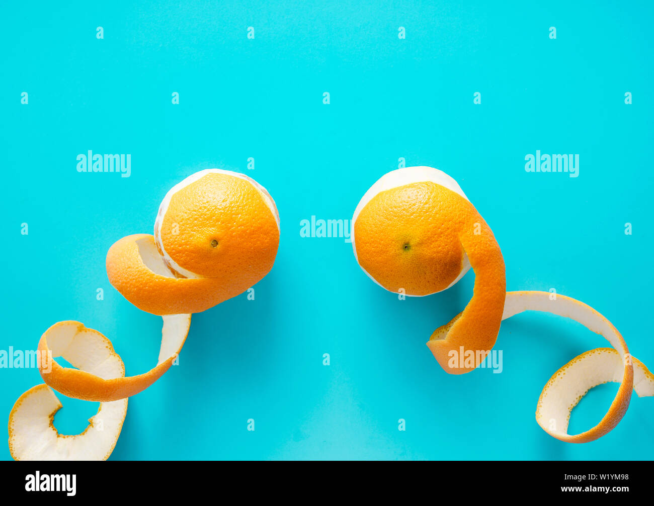 Orange slice on blue background.Ribbon fruit ideas Stock Photo - Alamy