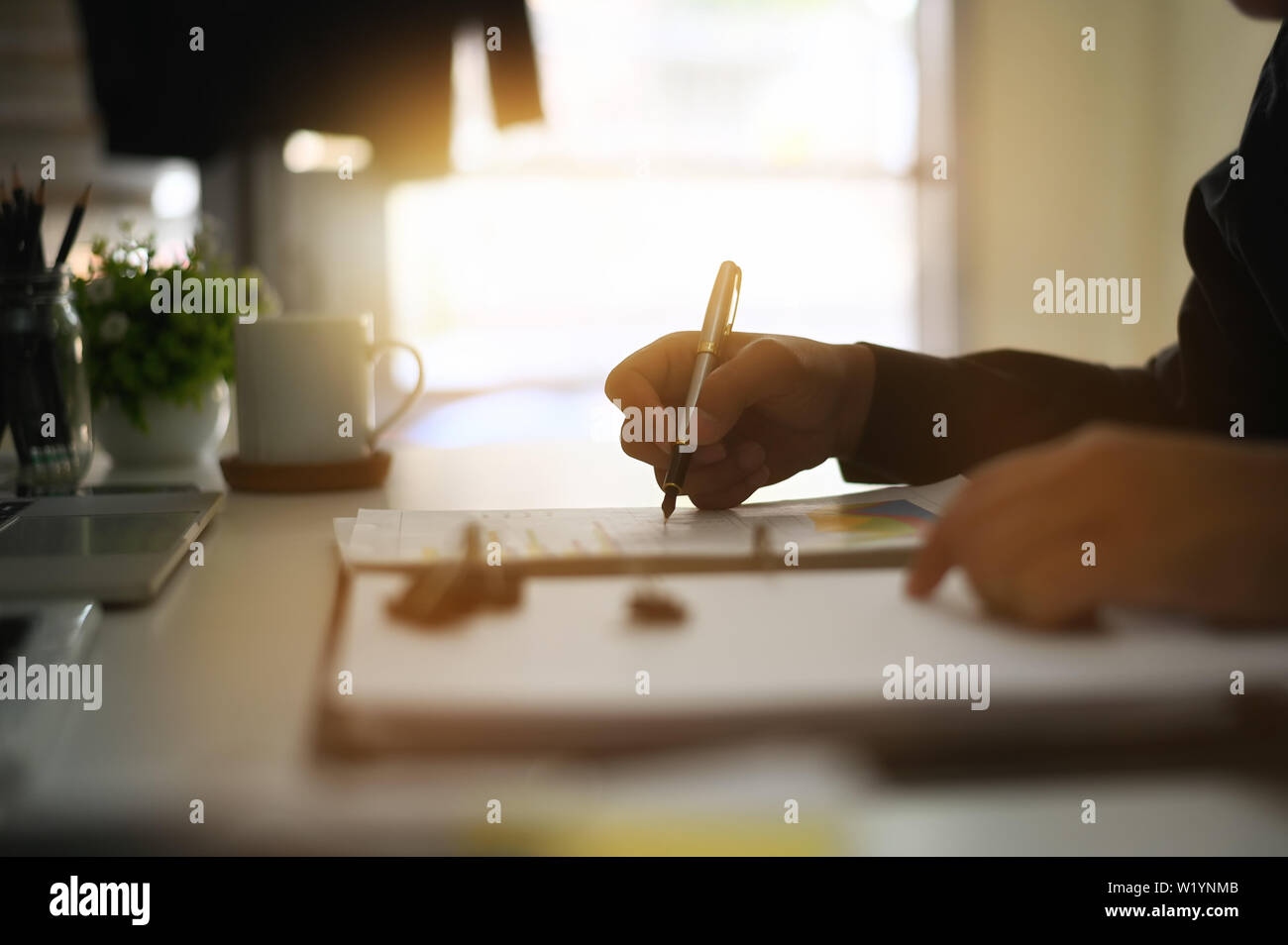 Closeup Businessman sign contract on document paper Stock Photo - Alamy