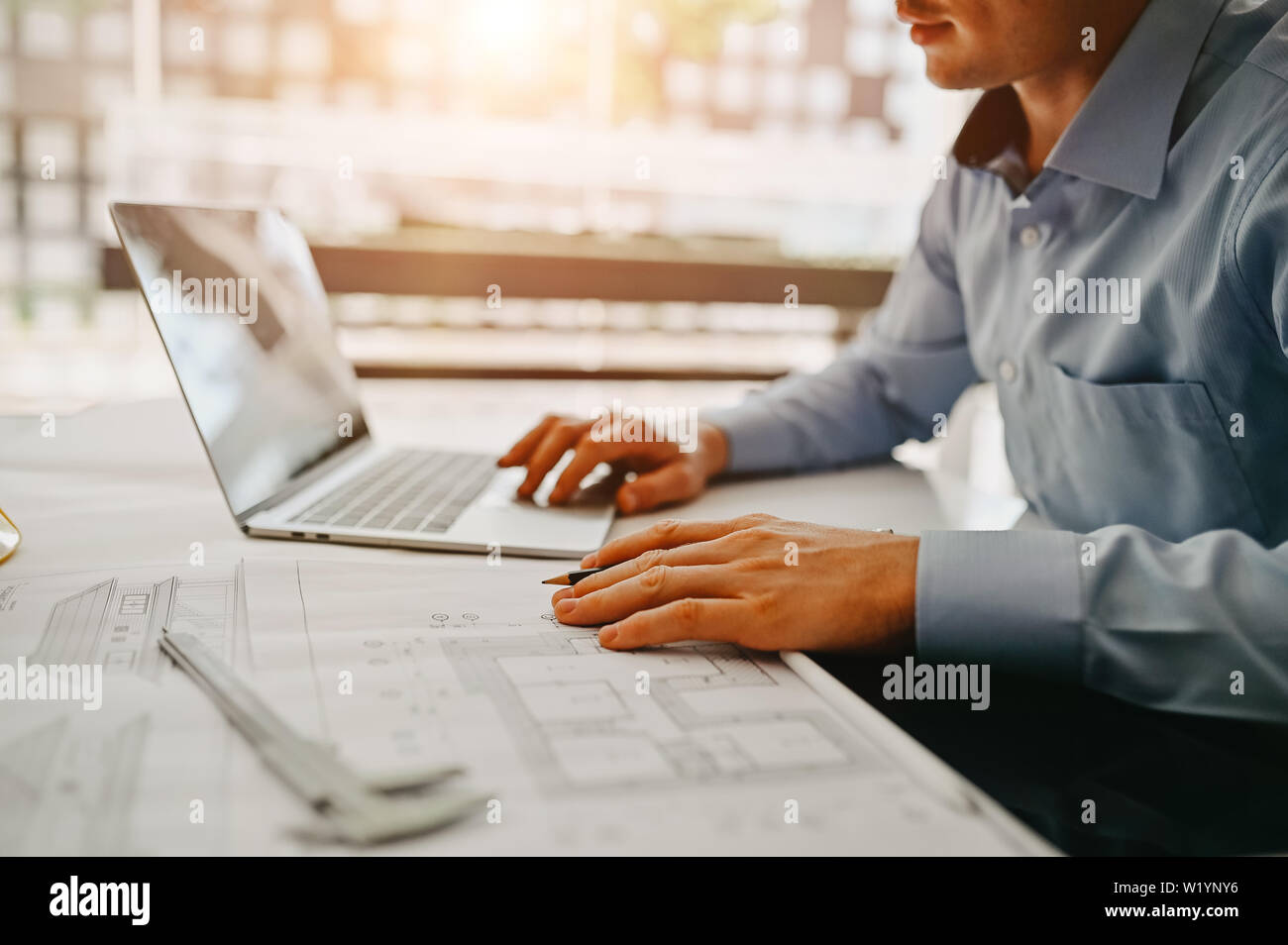 Architect design concept. Young engineer drawing of house structure on ...