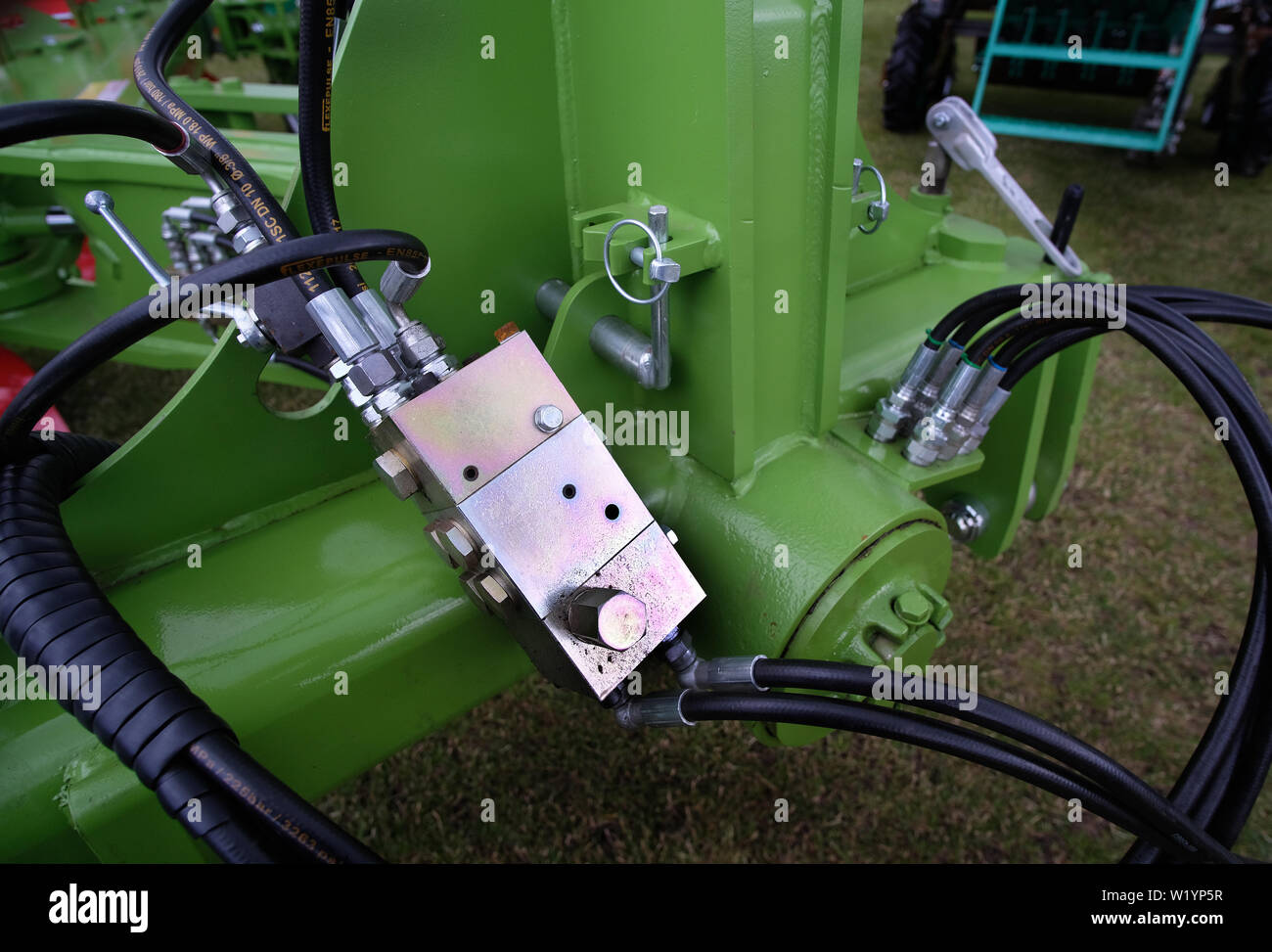 Modern hydraulic system detail on farming machinery Stock Photo - Alamy