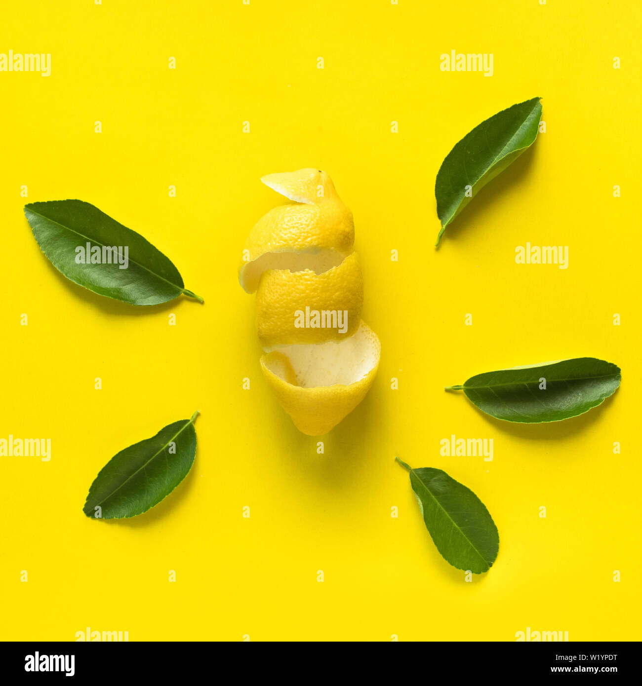 Top view of lemon and leaves on yellow background.concepts ideas of ...