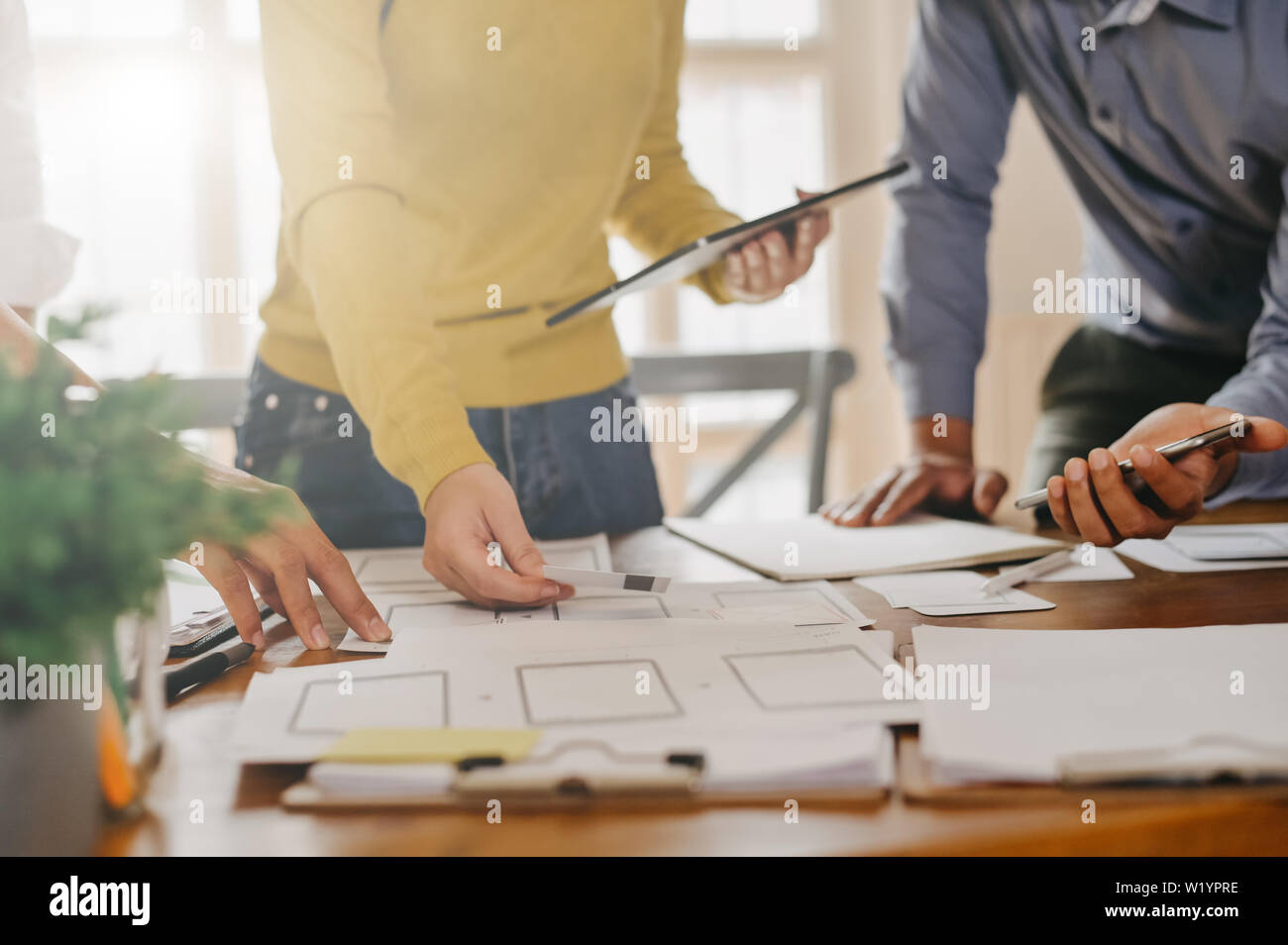 UX UI concept, Software design working and meeting on office table ...