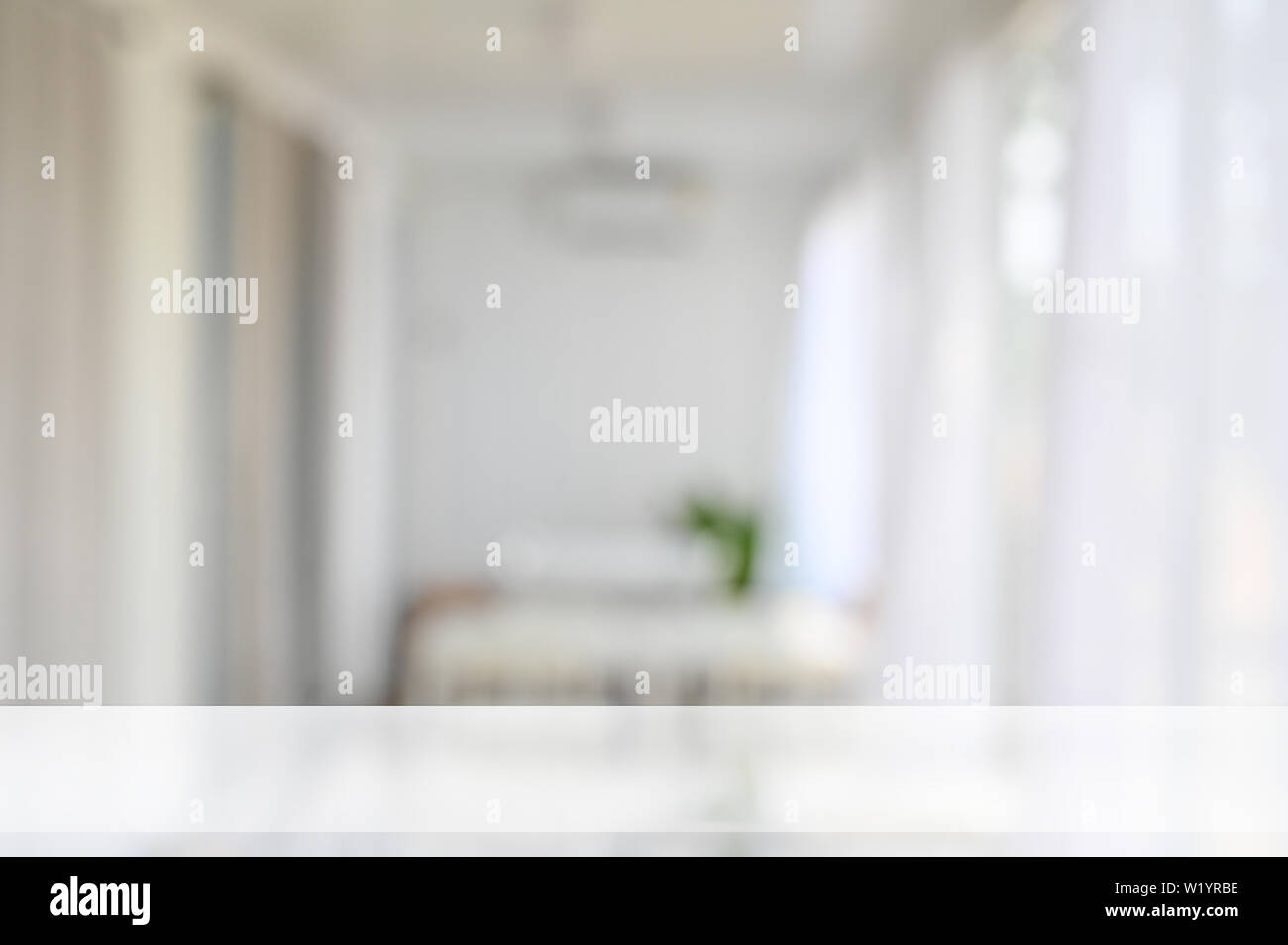 Empty table with montage in living room background Stock Photo - Alamy