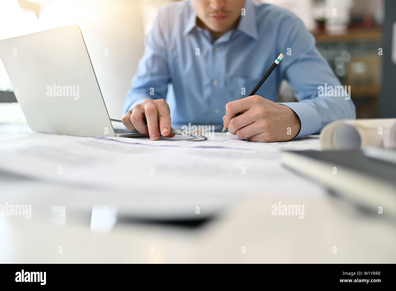 Architect design concept. Young engineer drawing of house structure on ...