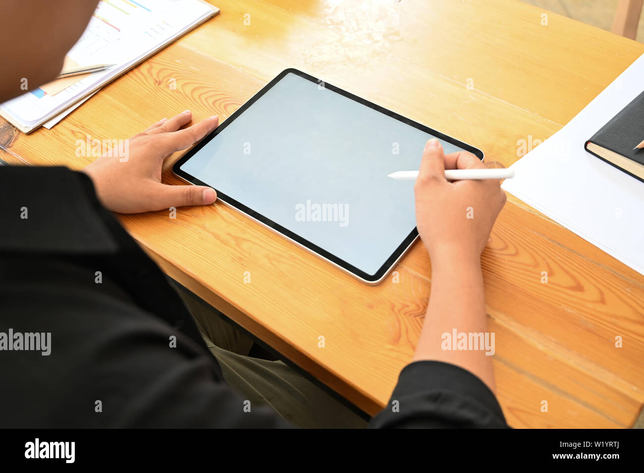 Above cropped shot man using mock tablet computer empty screen for ...
