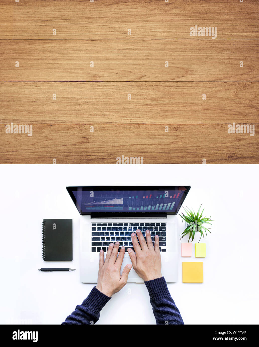 Male using computer laptop on white wood desk table background.Business ...
