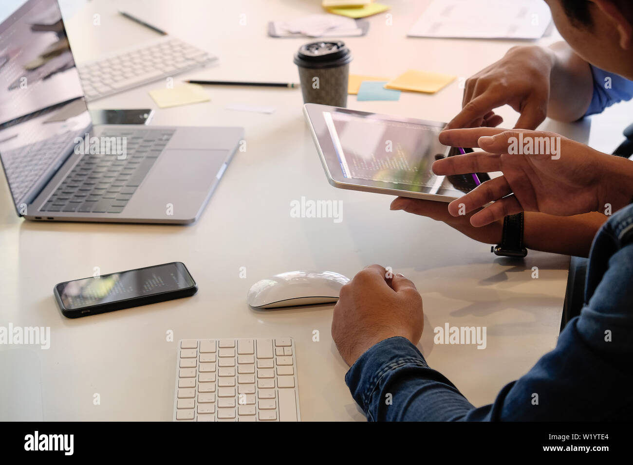 Website designer planning and meeting application development layout ...