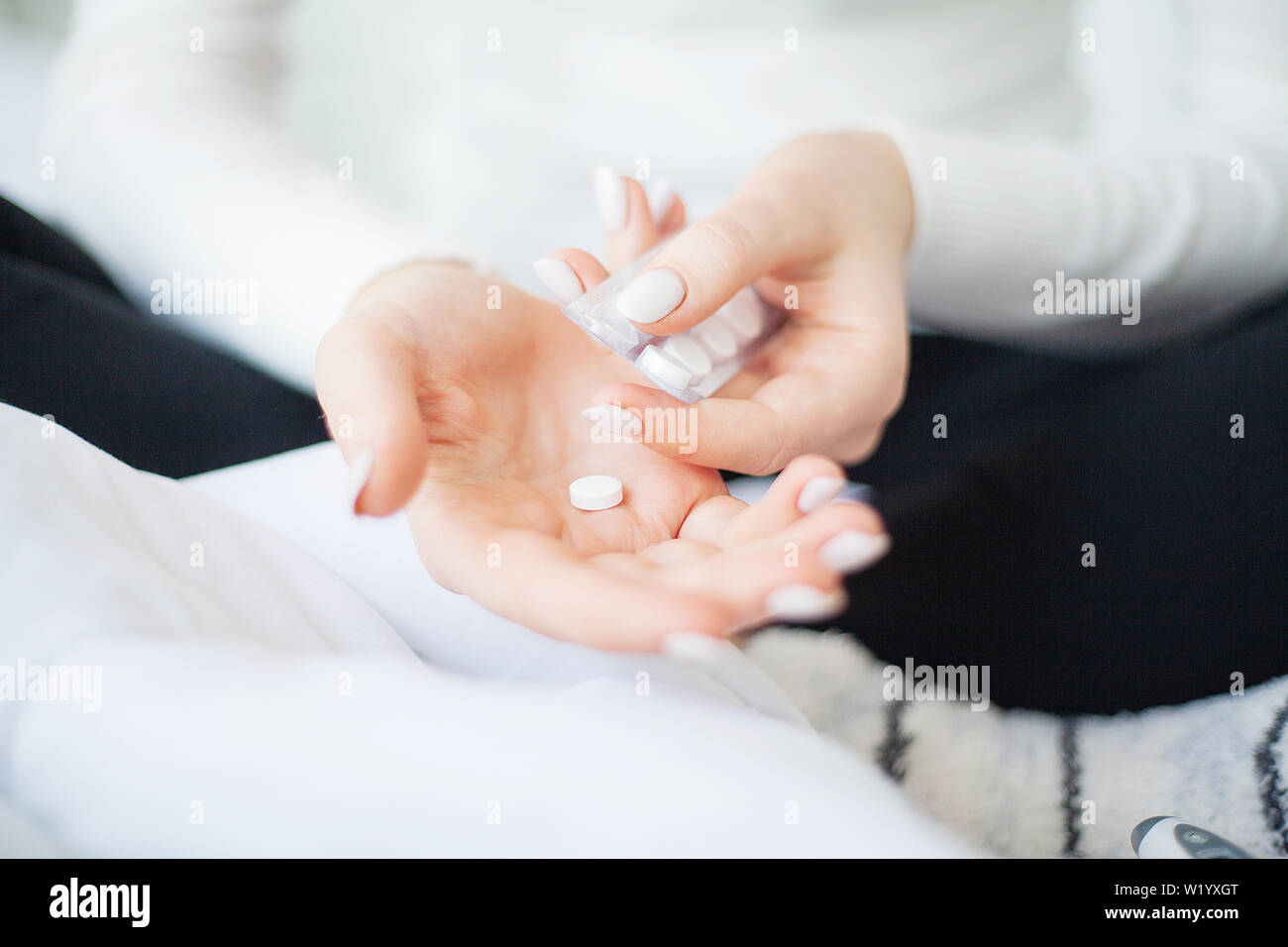 Medicine herb. Herbal pills in hand, palm, fingers with healthy medical ...