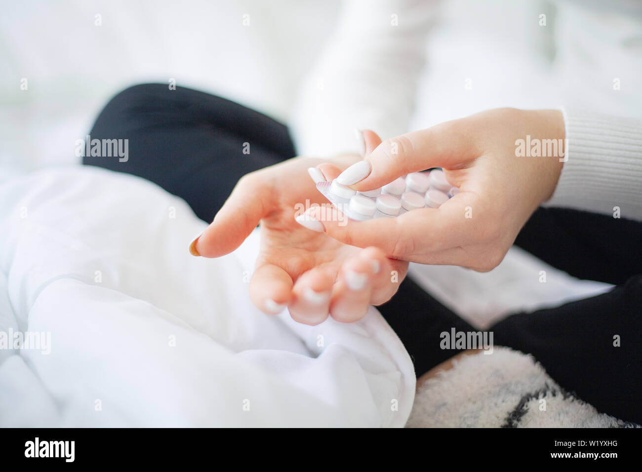 Medicine herb. Herbal pills in hand, palm, fingers with healthy medical ...