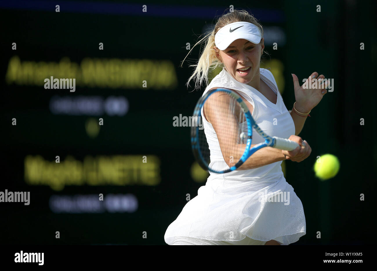 Amanda Anisimova in action on day four of the Wimbledon Championships ...