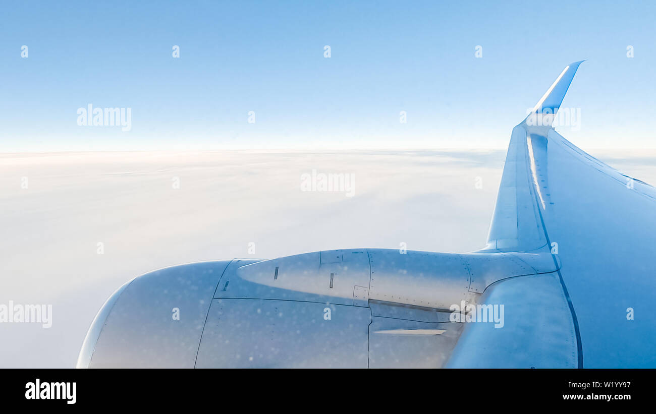 View from the window seat of commercial passenger airplane Stock Photo ...