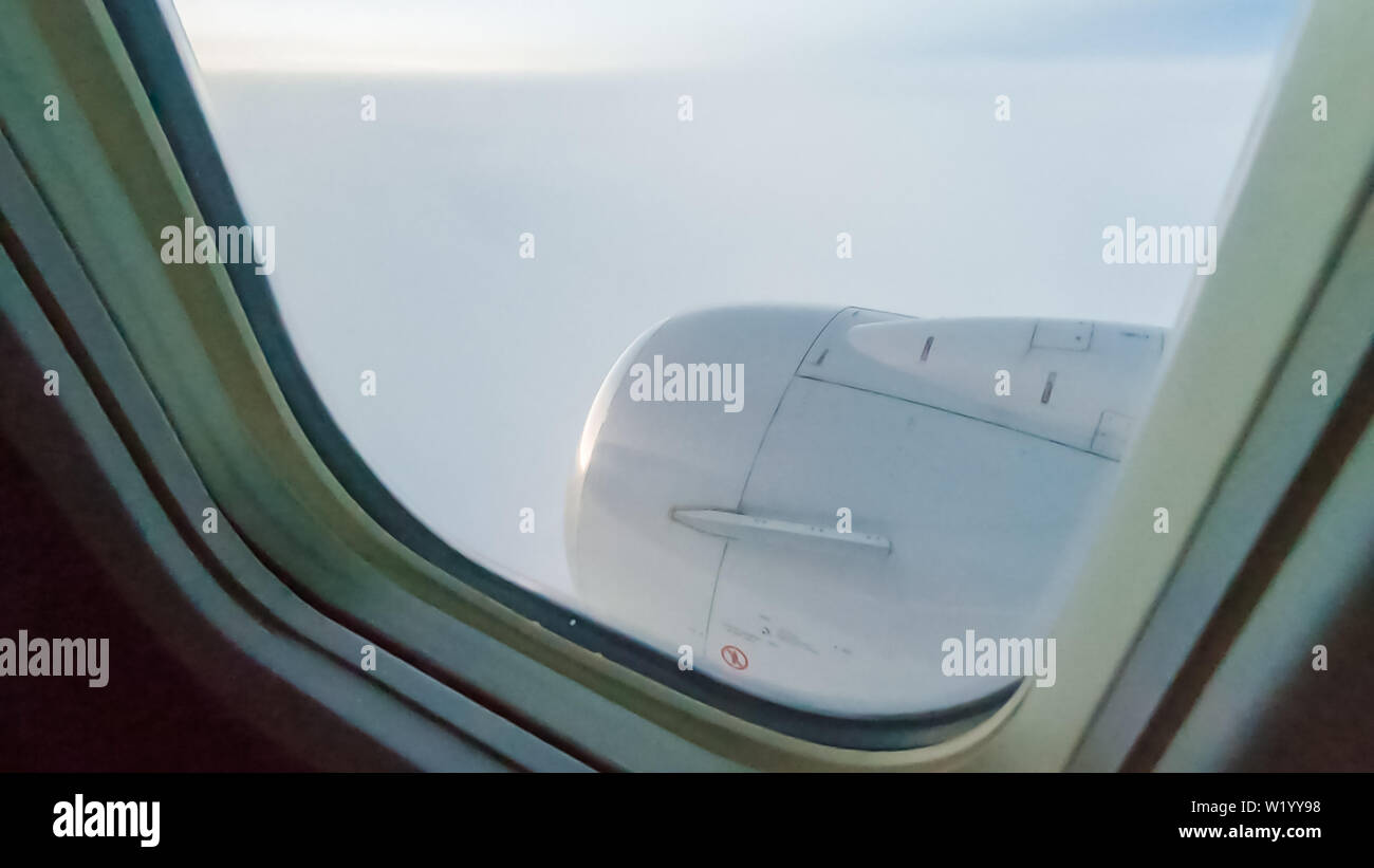 View from the window seat of commercial passenger airplane Stock Photo ...