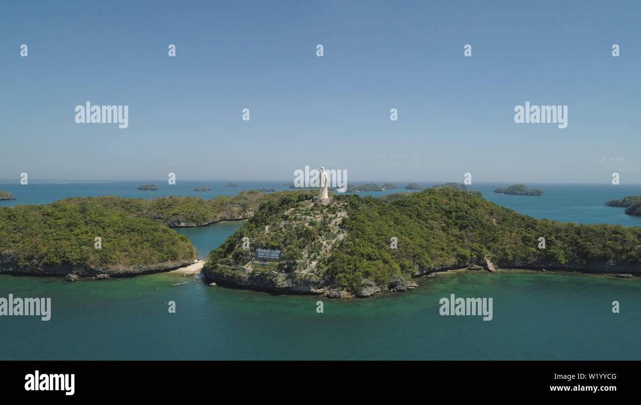 Statue of Jesus Christ on Pilgrimage island in Hundred Islands National ...