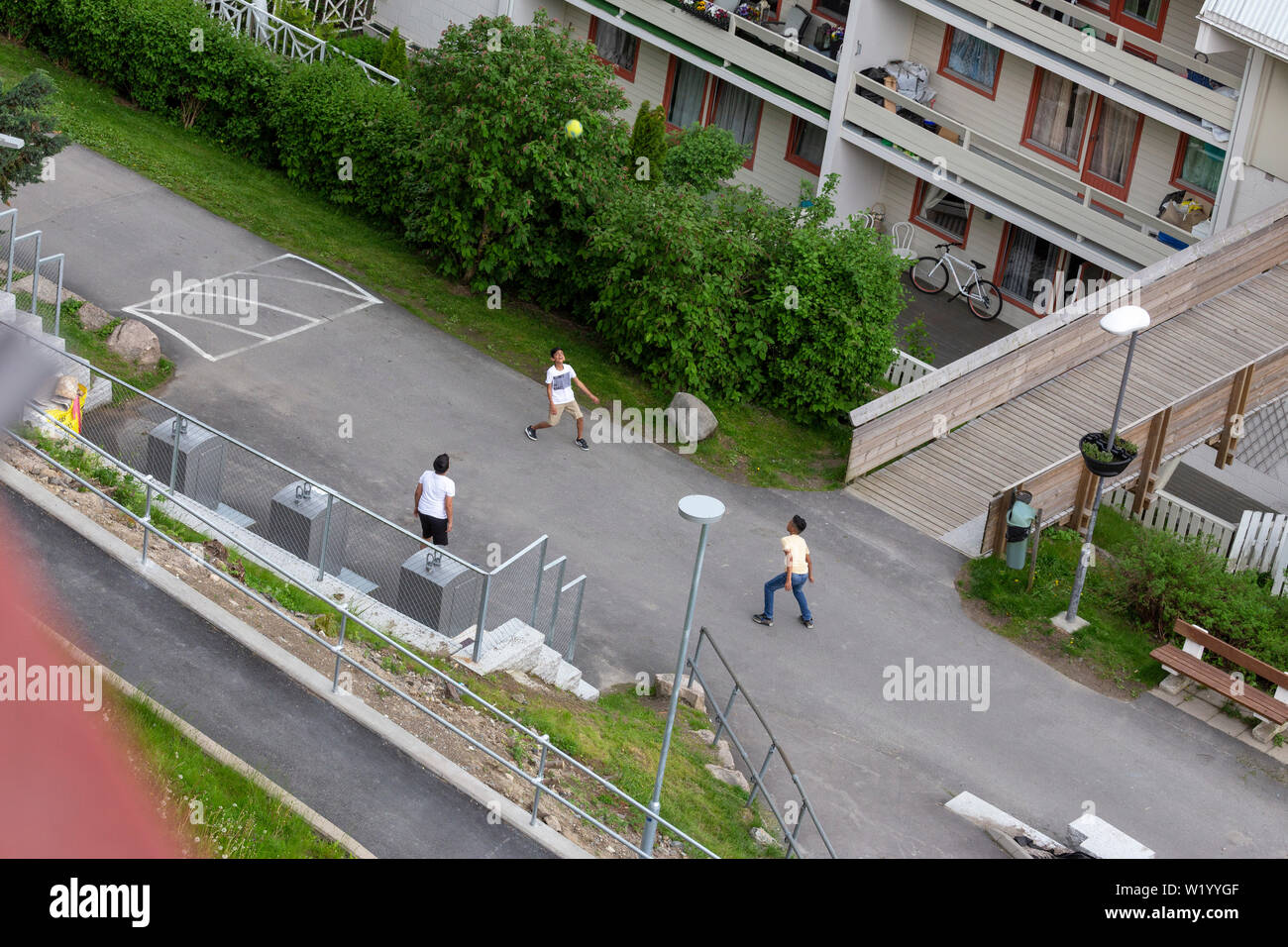 Adolescence boys playing football hi-res stock photography and images ...