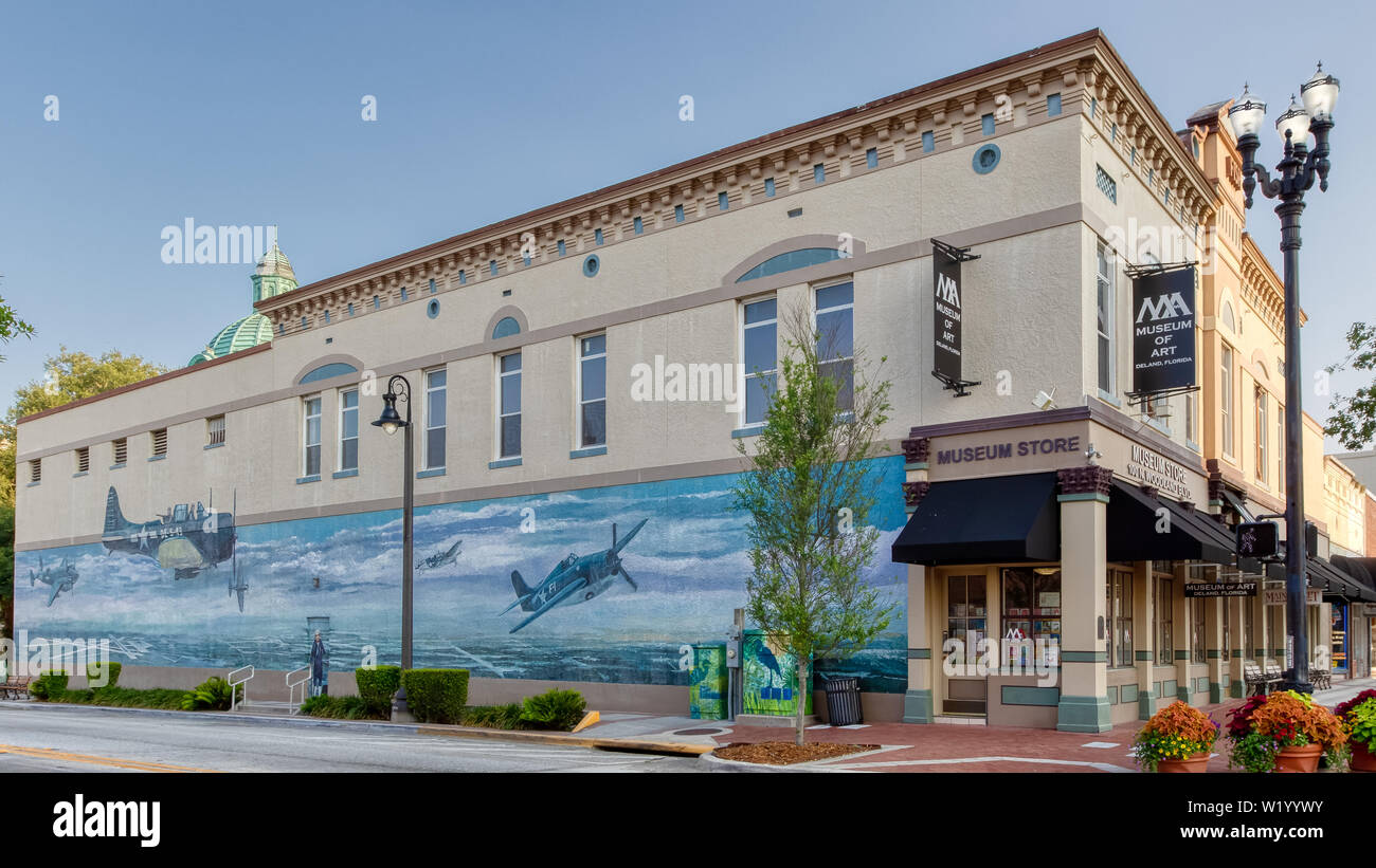 Musuem of Art and Store with World War II mural painted on the side of ...