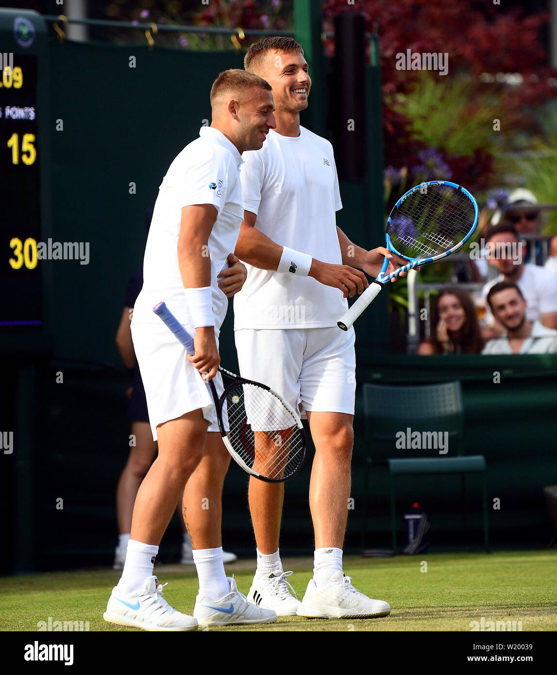 Dan Evans and Lloyd Glasspool during their doubles match on day four of ...
