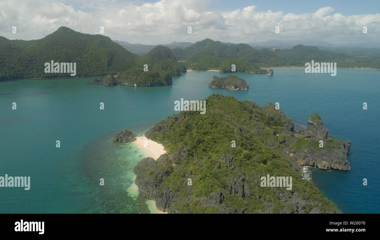 Aerial view of islands with sand beach and turquoise water in blue ...