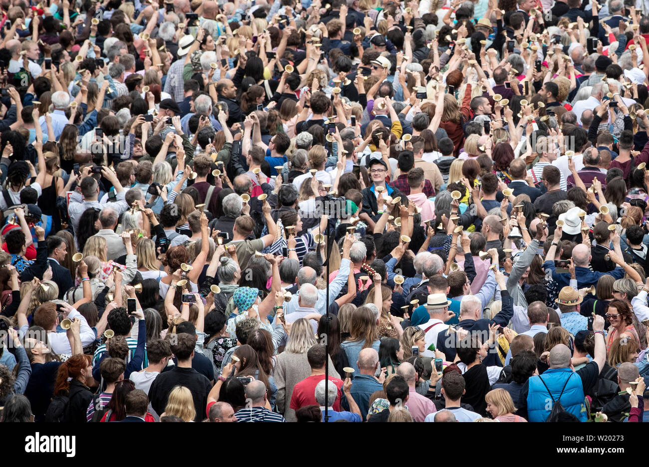 Thousands of people come together in Cathedral Gardens in Manchester ...