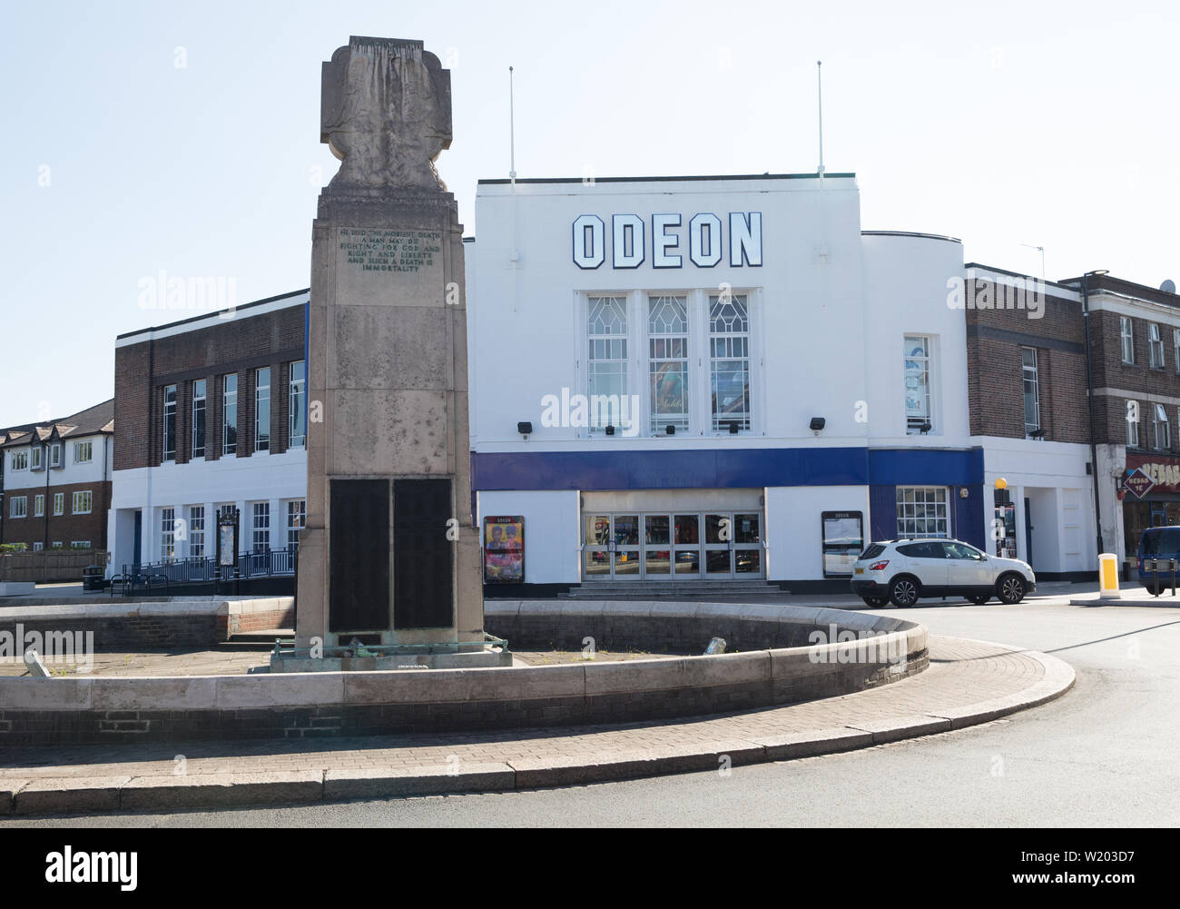 The war memorial with the Odeon Cinema in the background in Beckenham ...