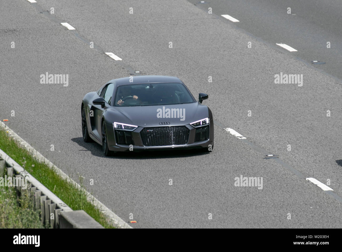 High-end Luxury Audi R8 Sports car; UK Vehicular traffic, transport ...