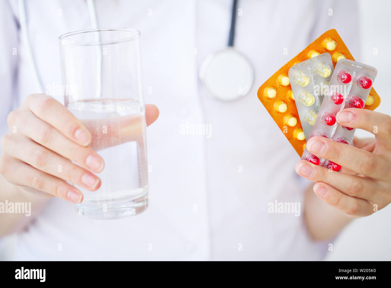 Concept Of The Global Healthcare And Medicine. Doctor Holding Pack of ...