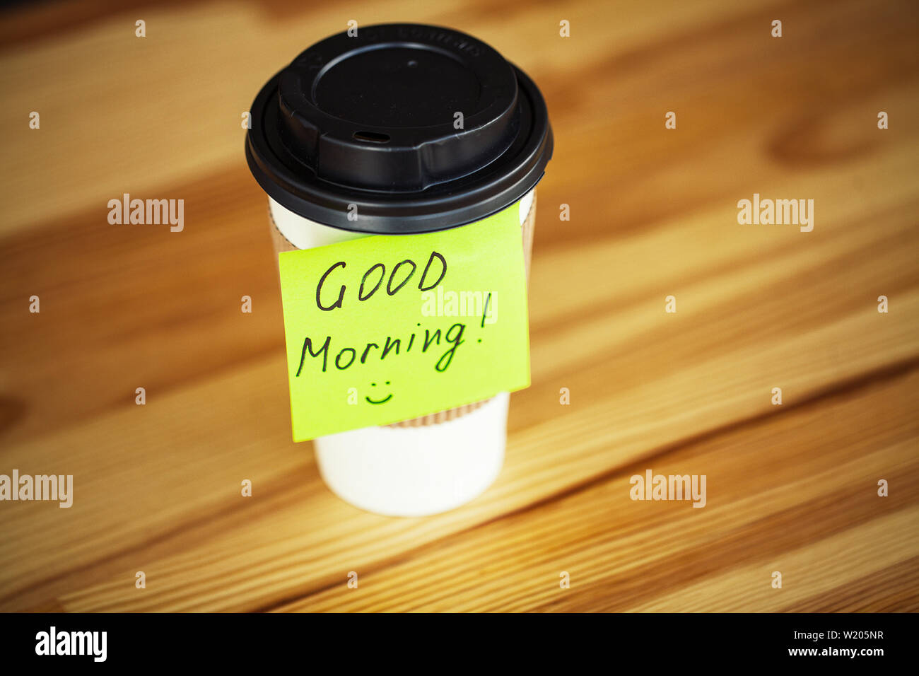 Good Morning. Coffee Time. Coffee to go and beans on a wooden ...