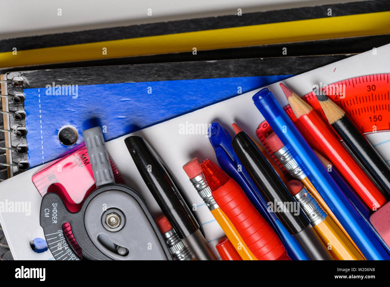 School supplies on a white background Stock Photo - Alamy