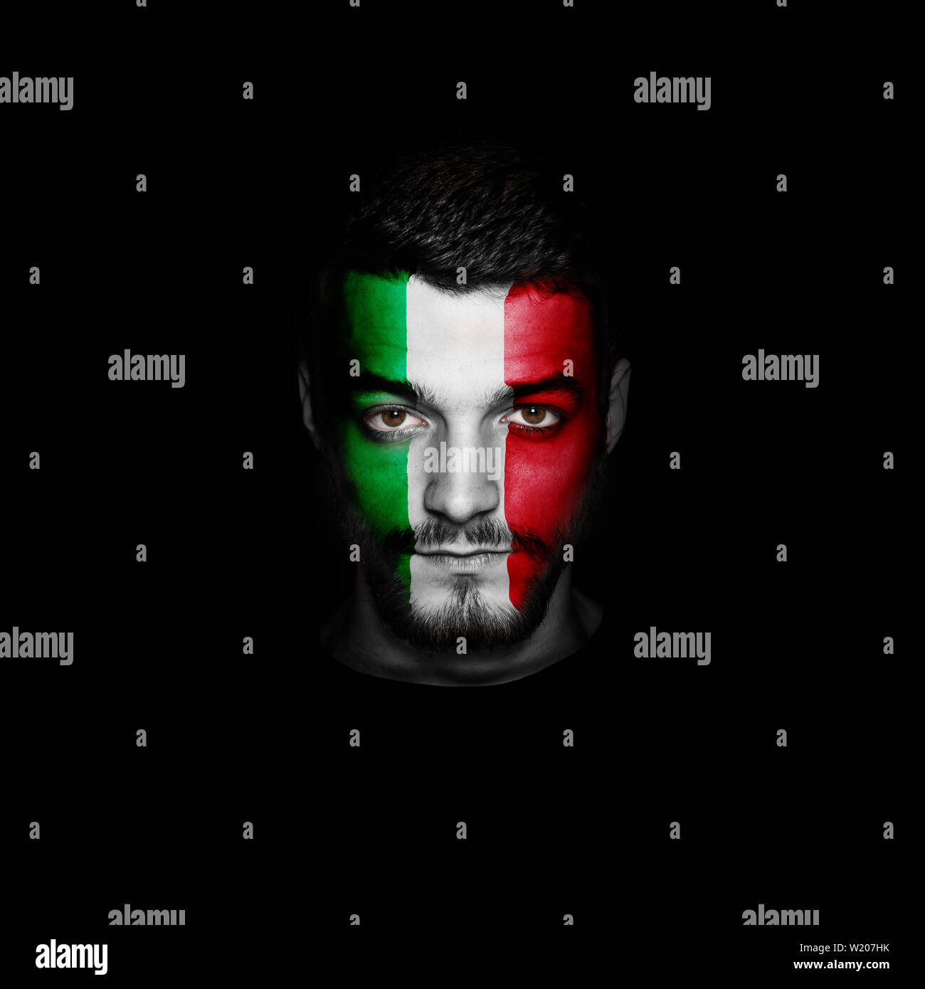 Flag of Italy painted on a face of a man Stock Photo - Alamy
