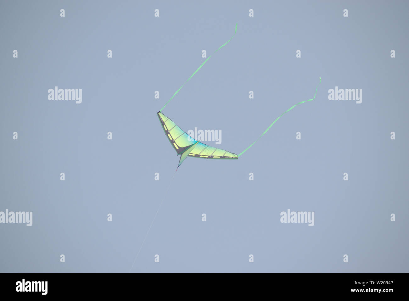 Colorful kite on the beach Stock Photo - Alamy