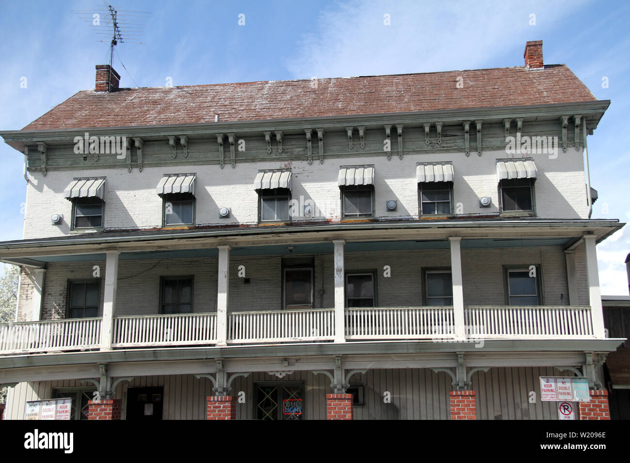 Facade of old massive building in downtown New Oxford, in Pennsylvania ...