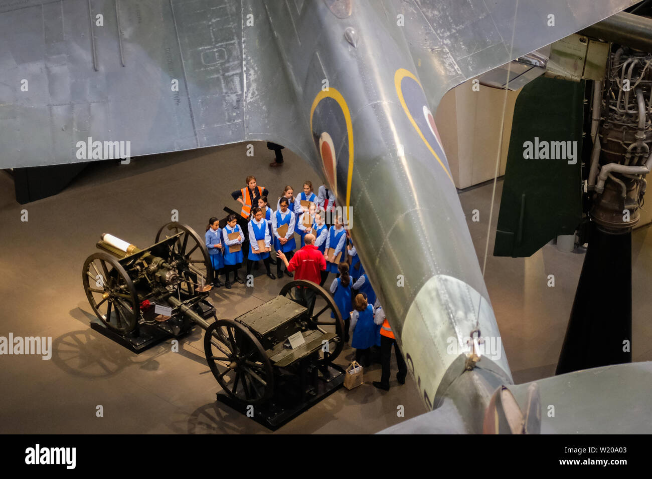 School class gathers below World War II Spitfire to hear about World ...