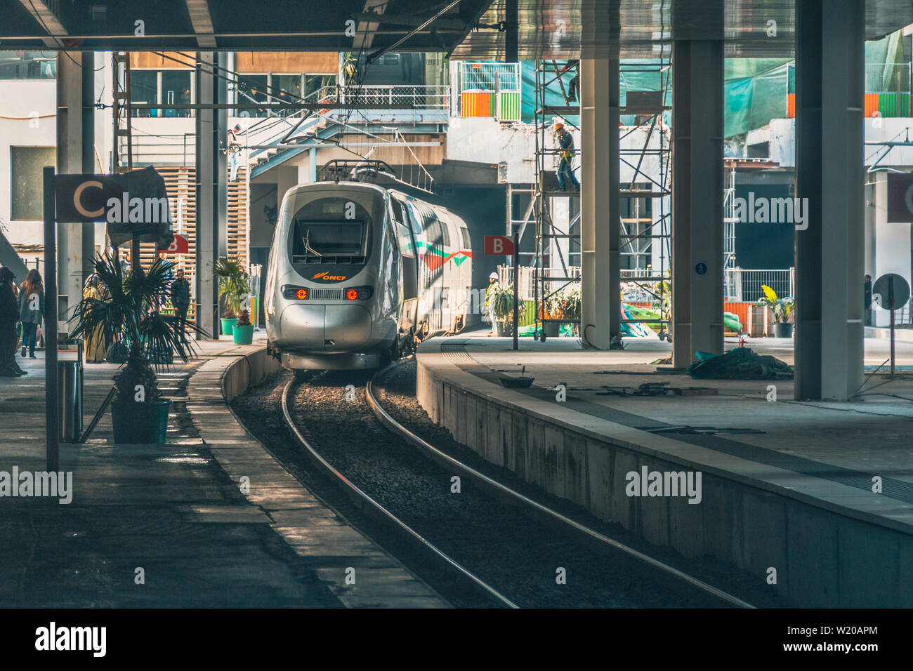 tramway tram train bike car taxi cross panning style Stock Photo - Alamy