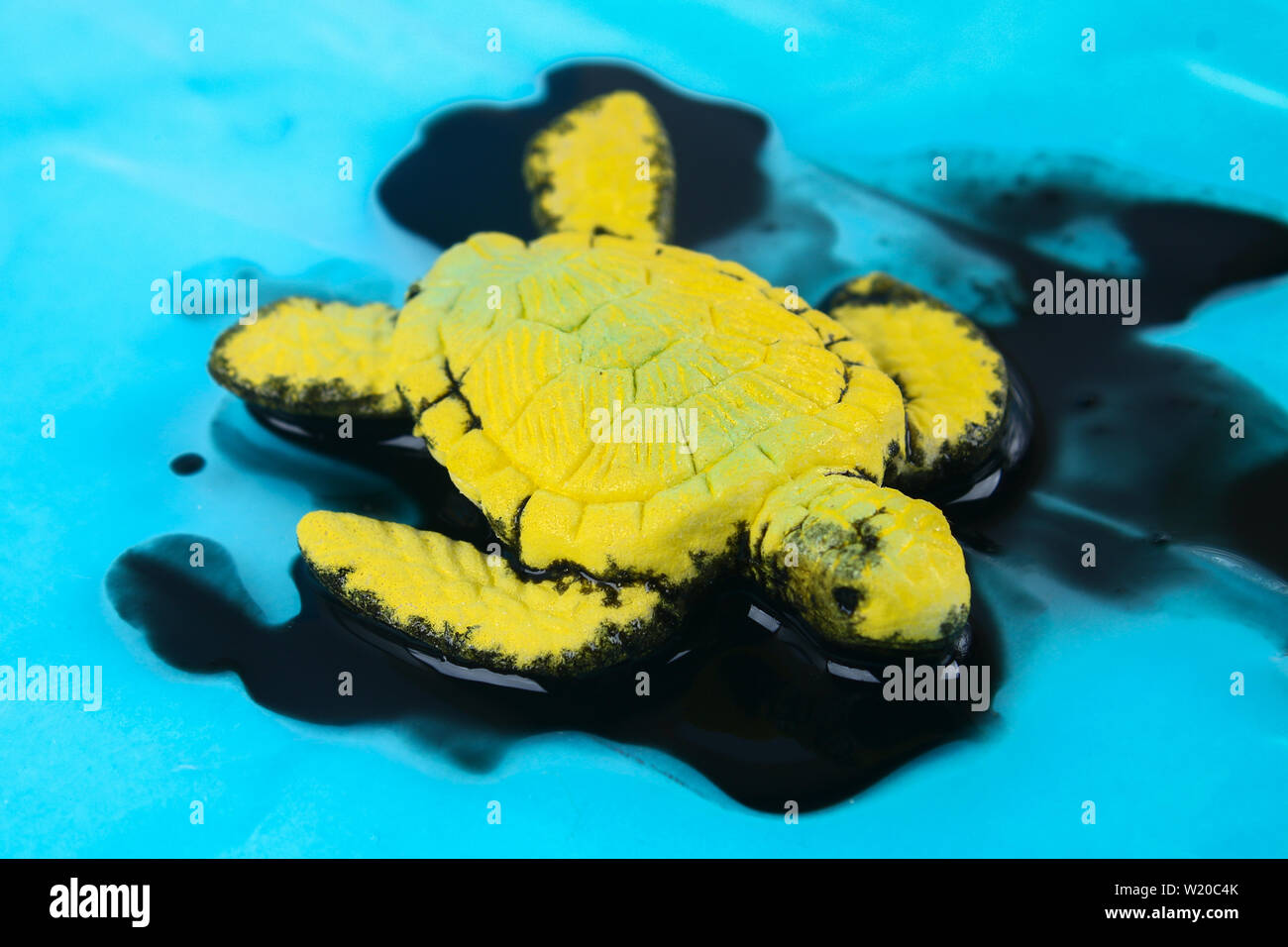 Turtle in oil. pollution in ocean environmental problem. Ecological ...
