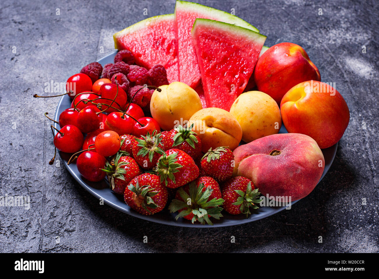 Different summer fruits and berries Stock Photo - Alamy