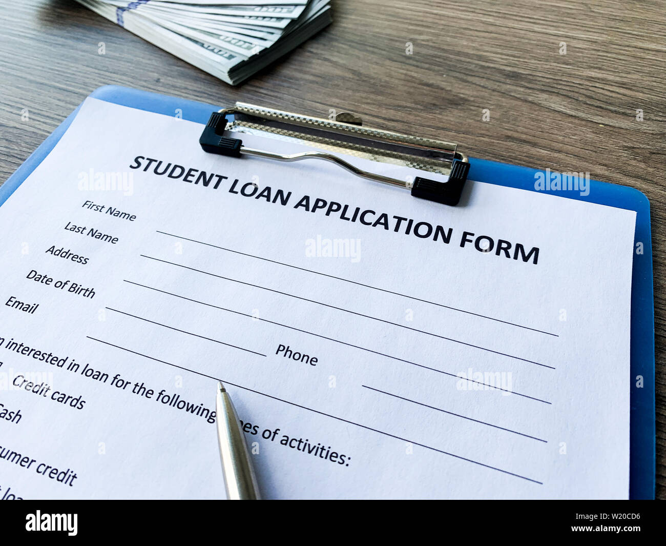 Student loan application form document on table Stock Photo - Alamy