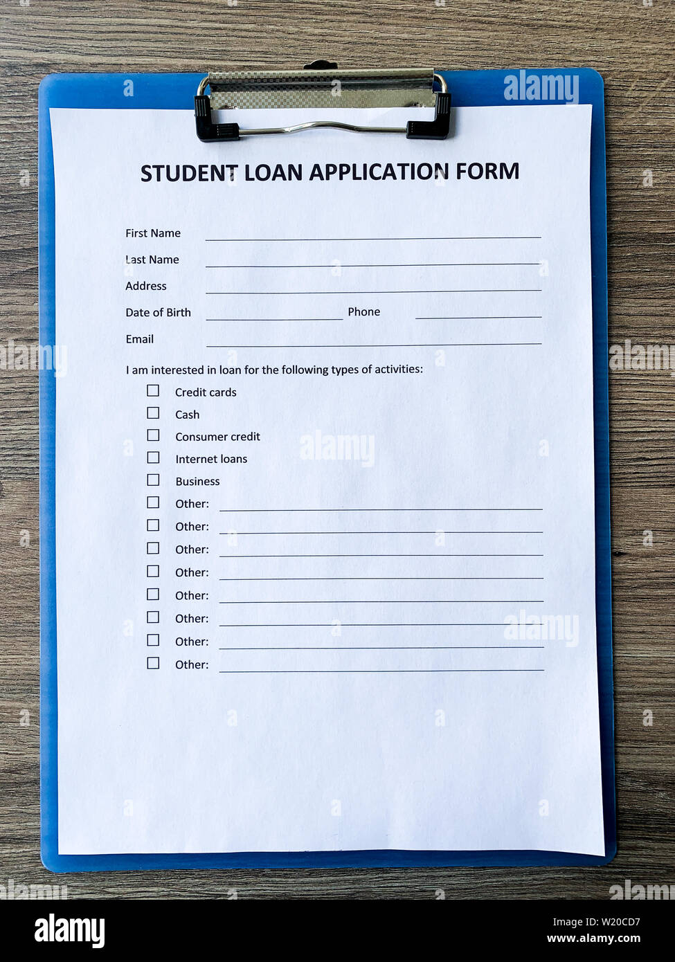 Student application loan form document on table Stock Photo - Alamy
