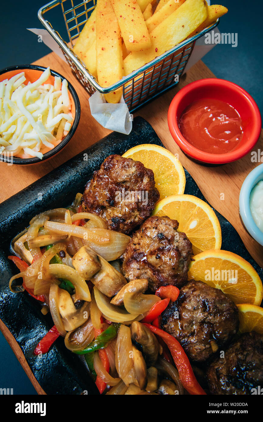 Grilled or roasted minced meat or meatballs food meal and vegetables ...