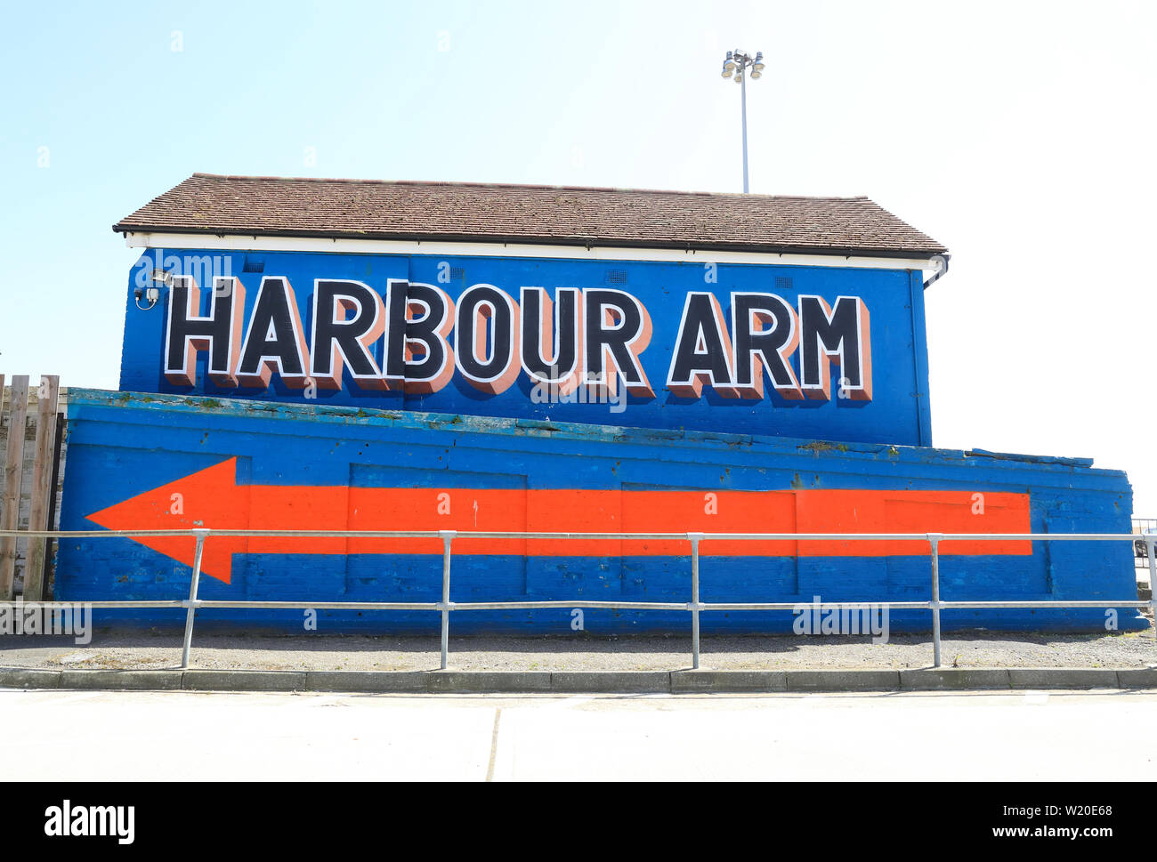 Sign for the Harbour Arm in Folkestone, a promenade out to sea ...
